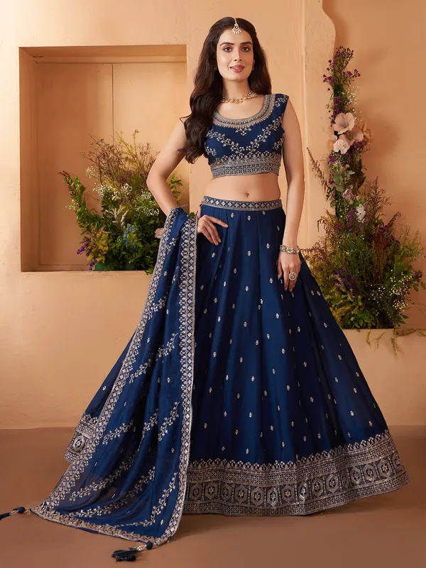 Blue silk lehenga choli with round neck festive...
