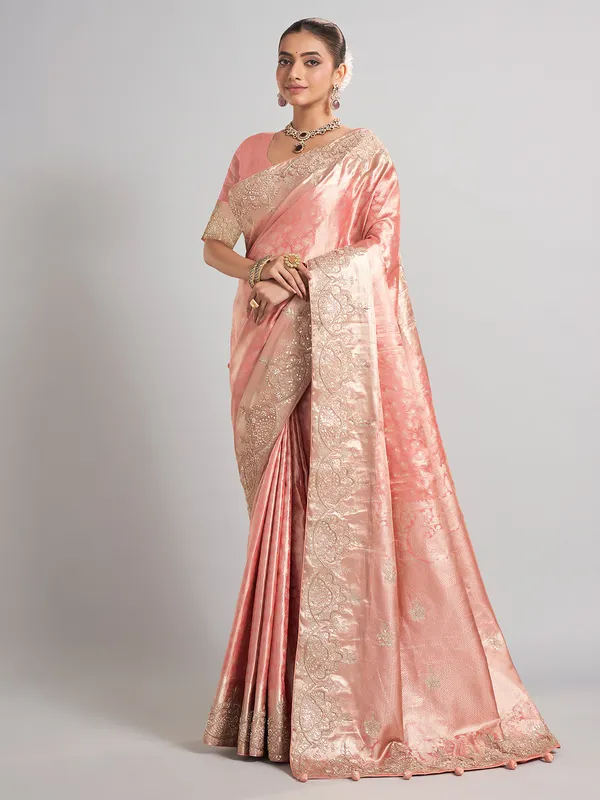 Gajari pink kanjivaram silk saree with traditional zari...