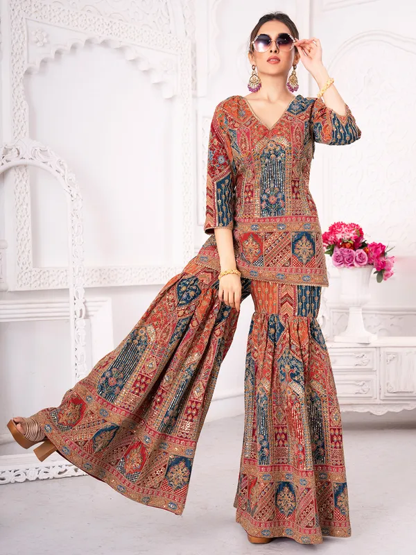 Multi color pakistani silk sharara suit with zardosi...