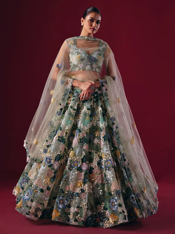 Pista green net lehenga choli with threaded pearl...