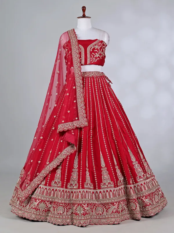 Red raw silk bridal lehenga choli with cutdana...