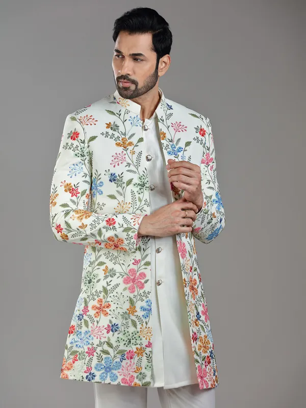 Regal cream silk jacket style indowestern with intricate...
